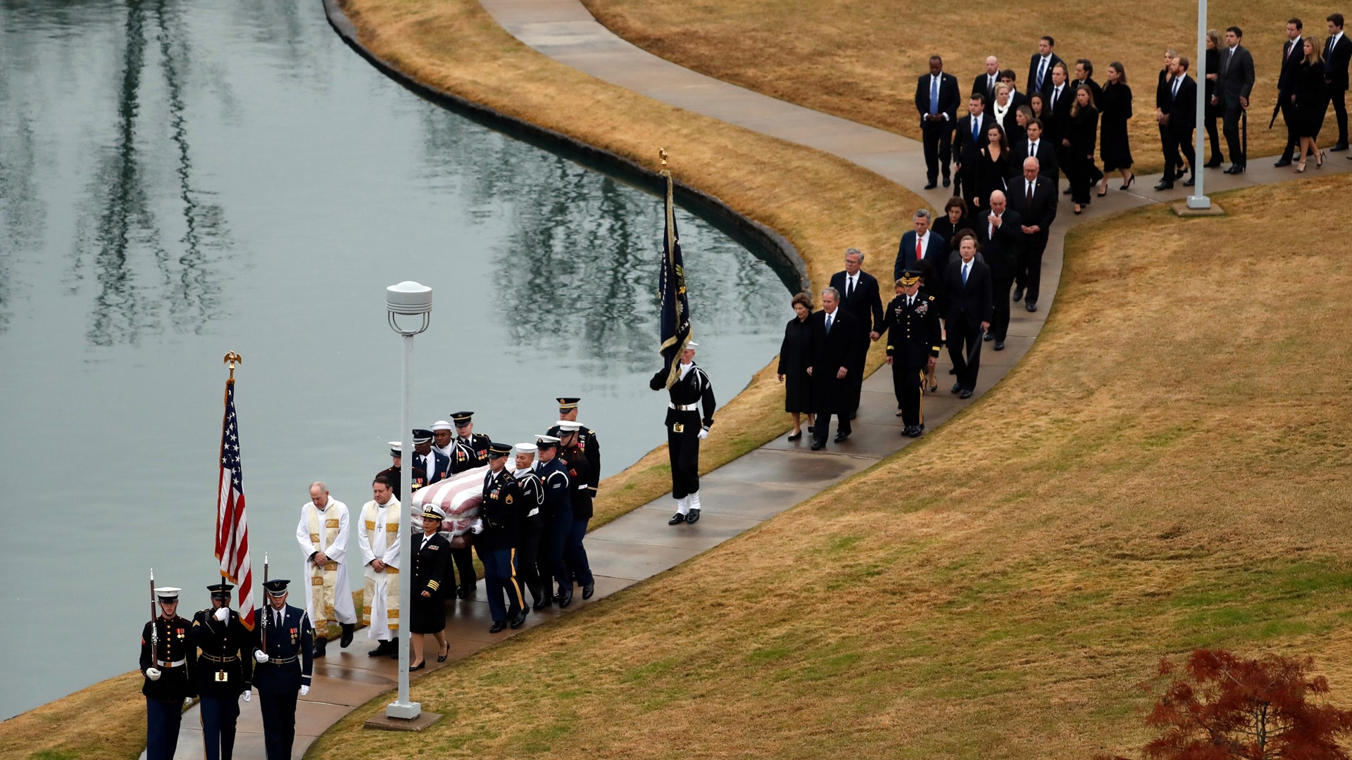 Navy performs 21-aircraft missing man flyover to honor President Bush ...