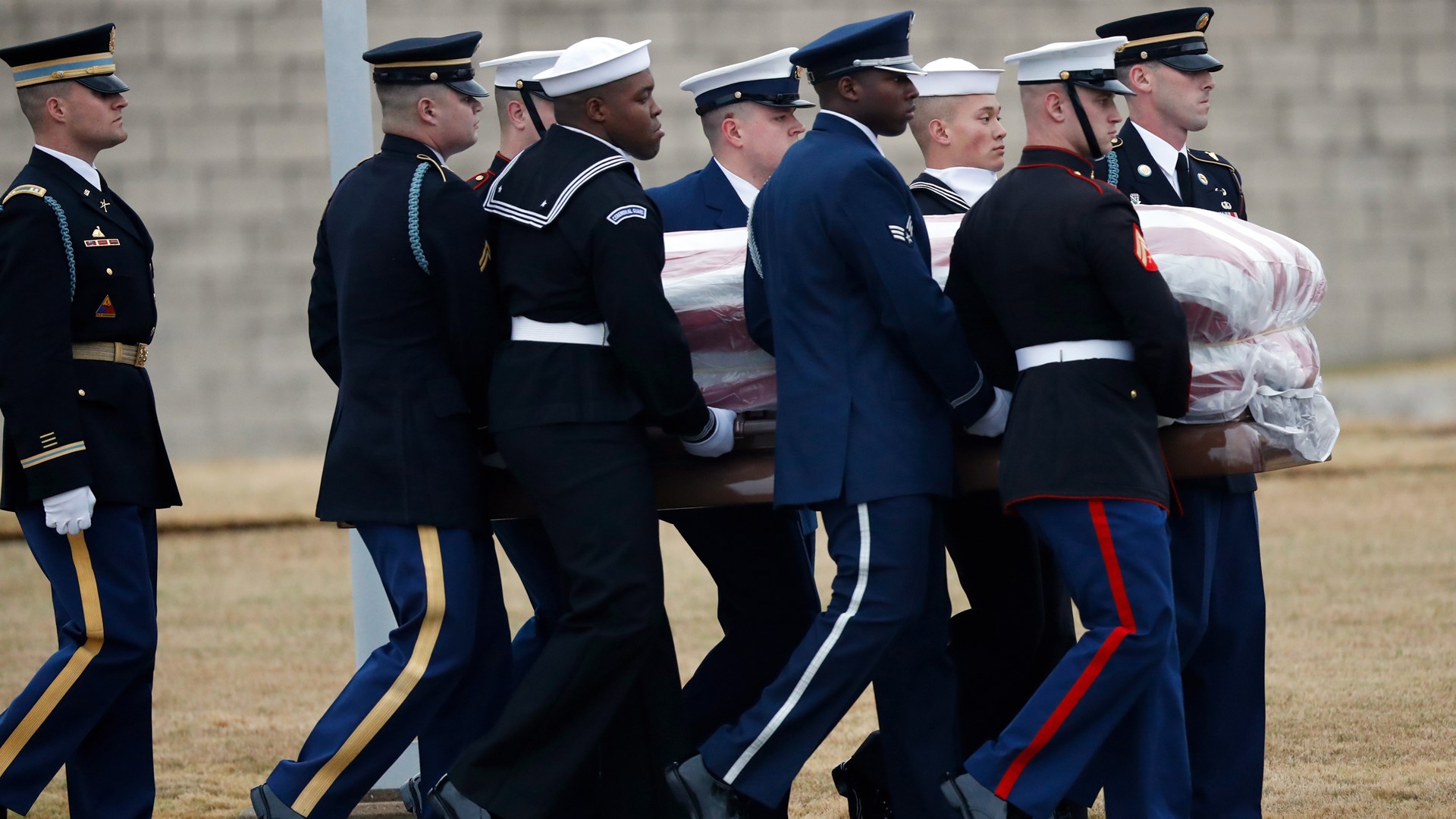 Navy performs 21-aircraft missing man flyover to honor President Bush ...