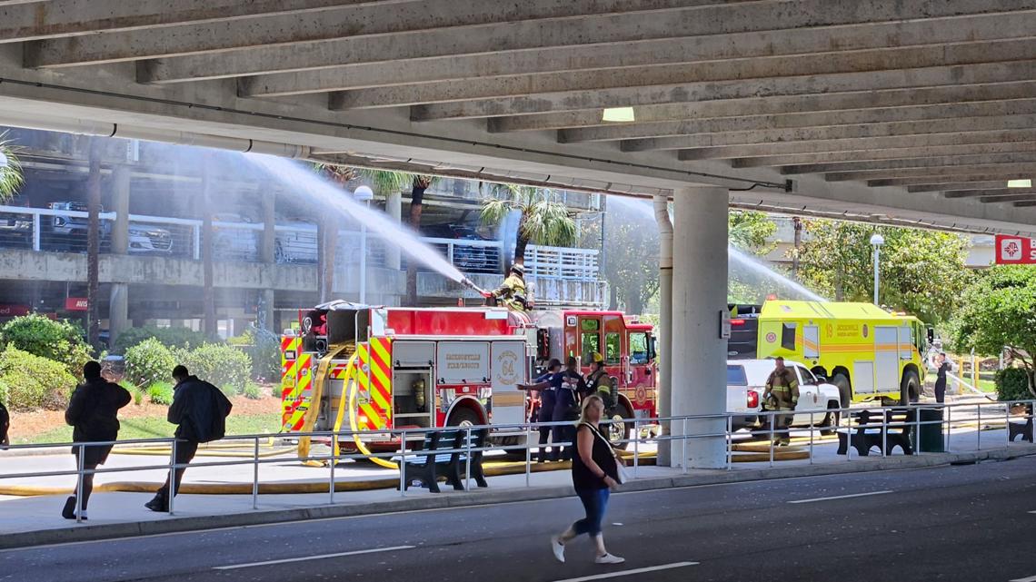 JAX airport closes following multi-vehicle fire in parking garage ...
