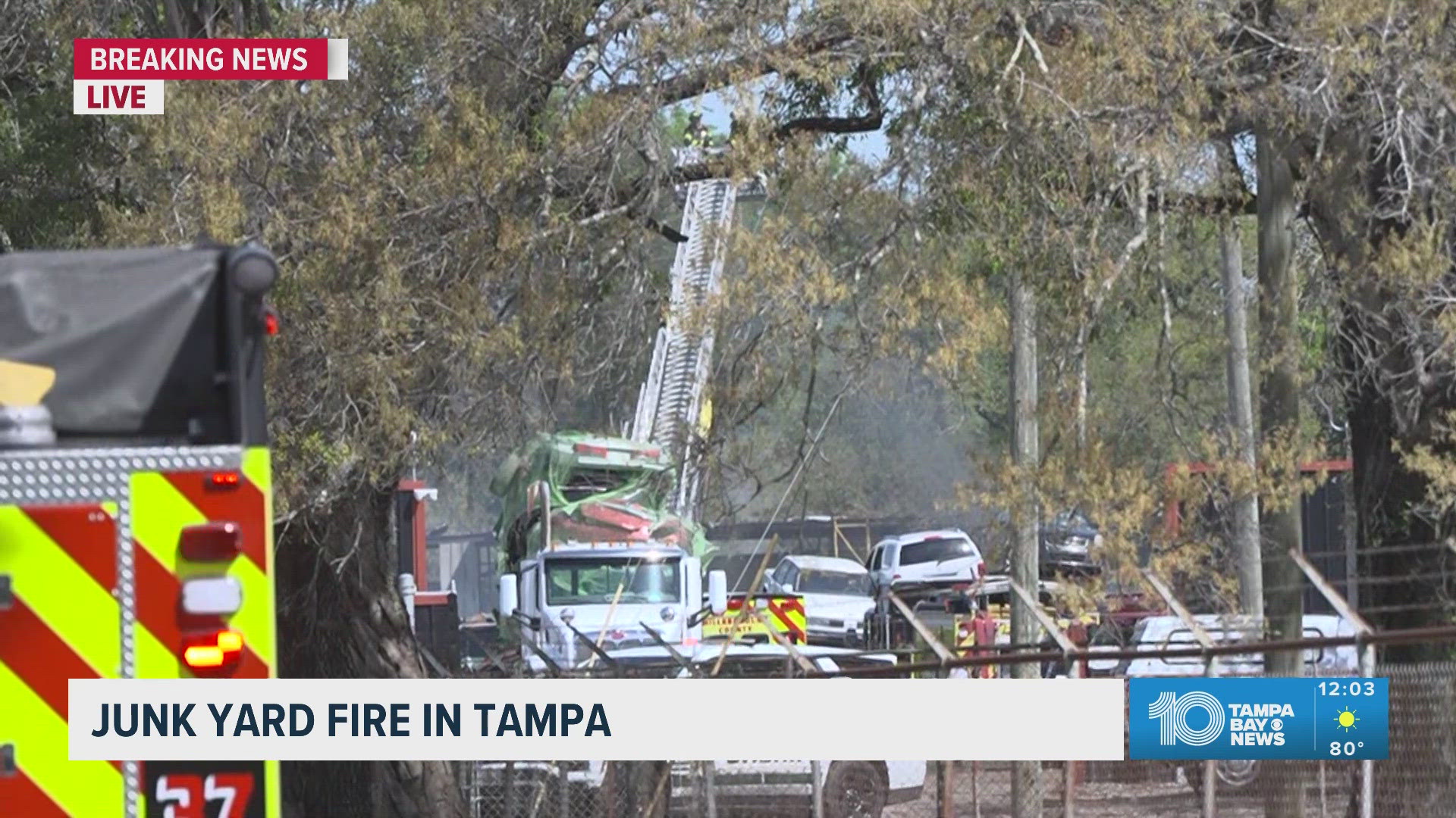 Hillsborough County crews contain 2-alarm fire at Tampa auto salvage ...