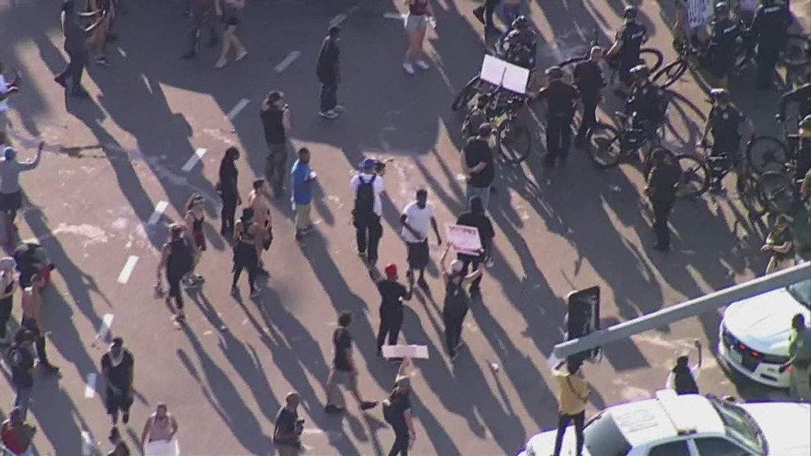 Police, demonstrators meet in heated protest near Tampa's Busch Gardens ...