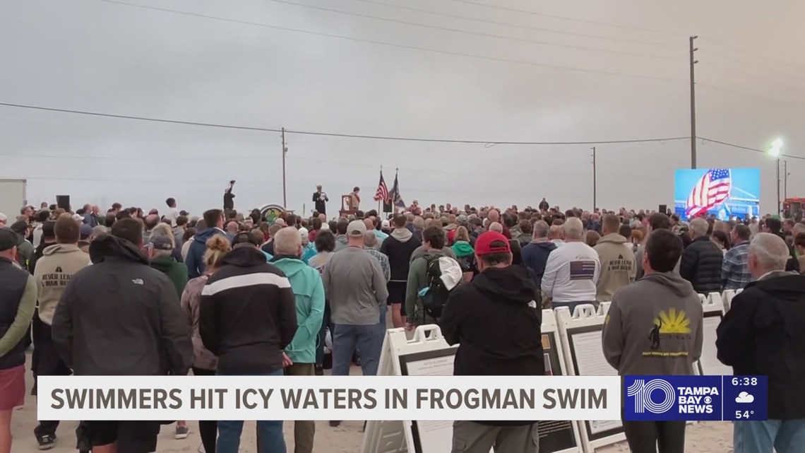 Hundreds take to to the water in Frogman Swim to honor fallen Navy SEALs, support Gold Star ...