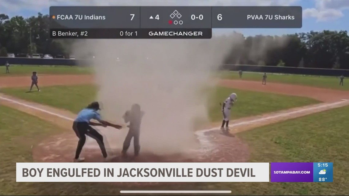 Video: Umpire saves child from dust devil at Florida youth baseball ...
