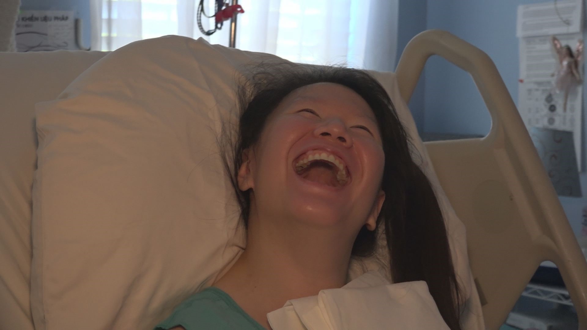 Ten years after library attack, Queena celebrates life and recovery ...