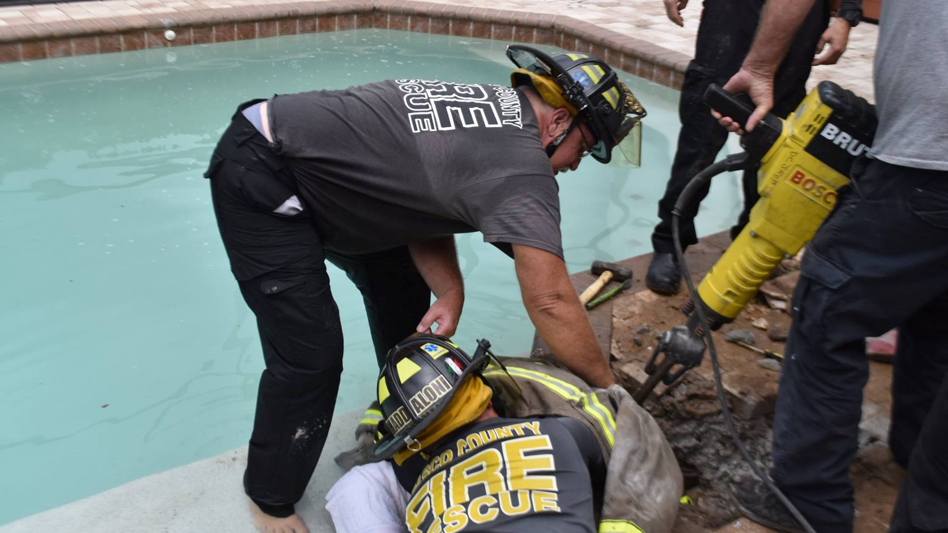 Pasco County boy gets arm stuck in pool tube; firefighters have to dig ...