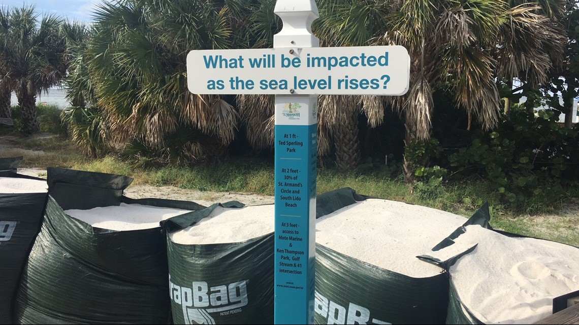 Photos: High tide and storm surge causes flooding in Longboat Key, St ...