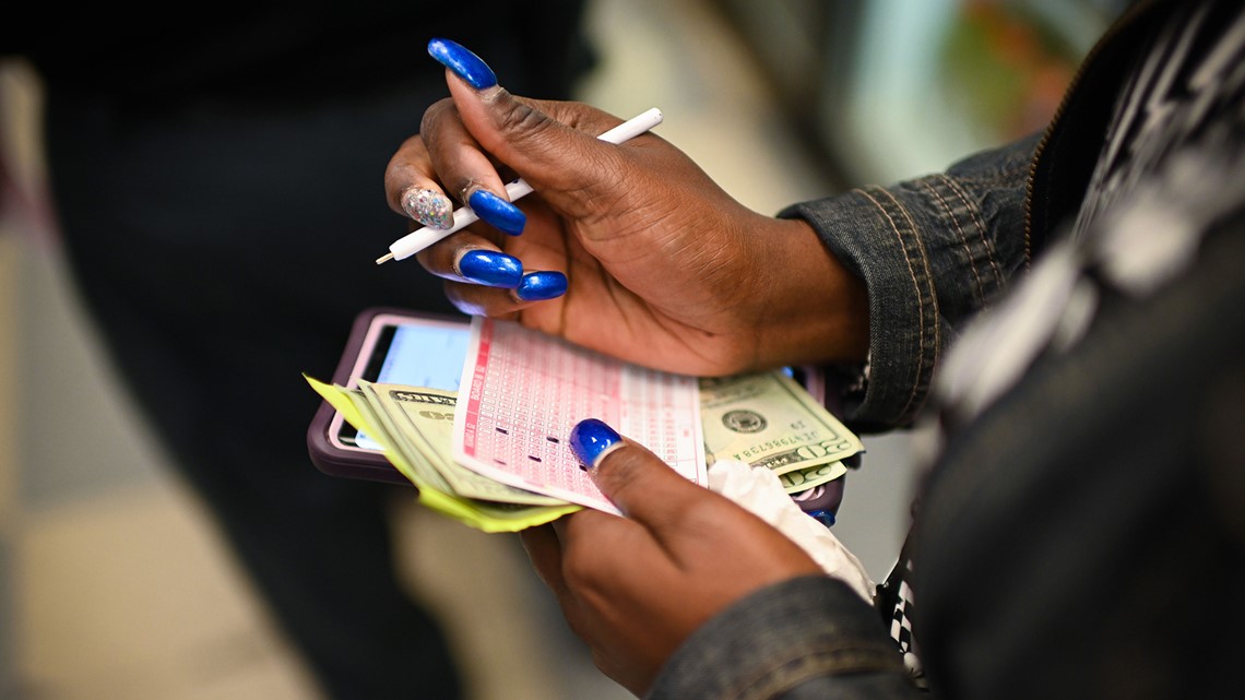 Jamaican lottery winner wears 'Scream' mask to keep identity a secret ...