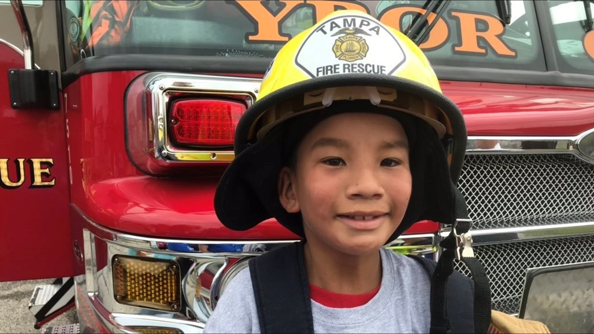 A firefighter for a day: Local boy puts on uniform, takes out fire ...