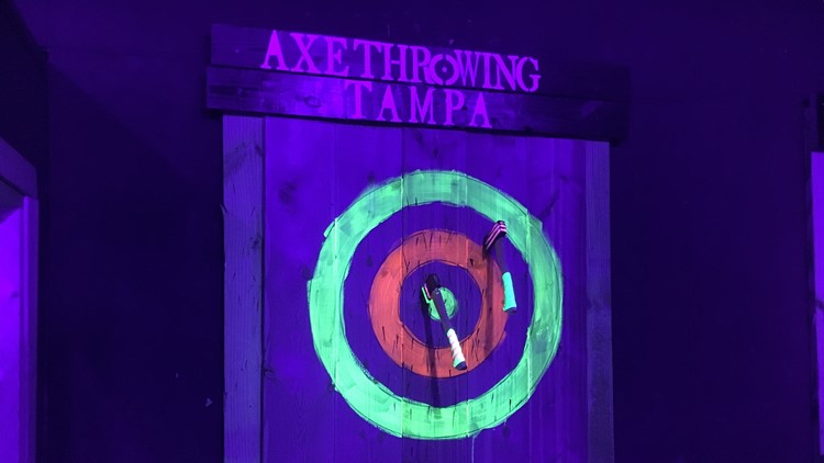 Axe Throwing Tampa turns off the lights for glow-in-the-dark axe ...