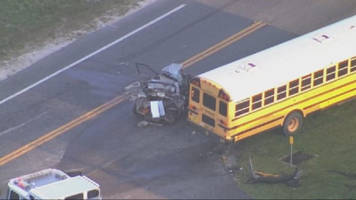 1 hurt after car crashes into bus, no students injured | wtsp.com