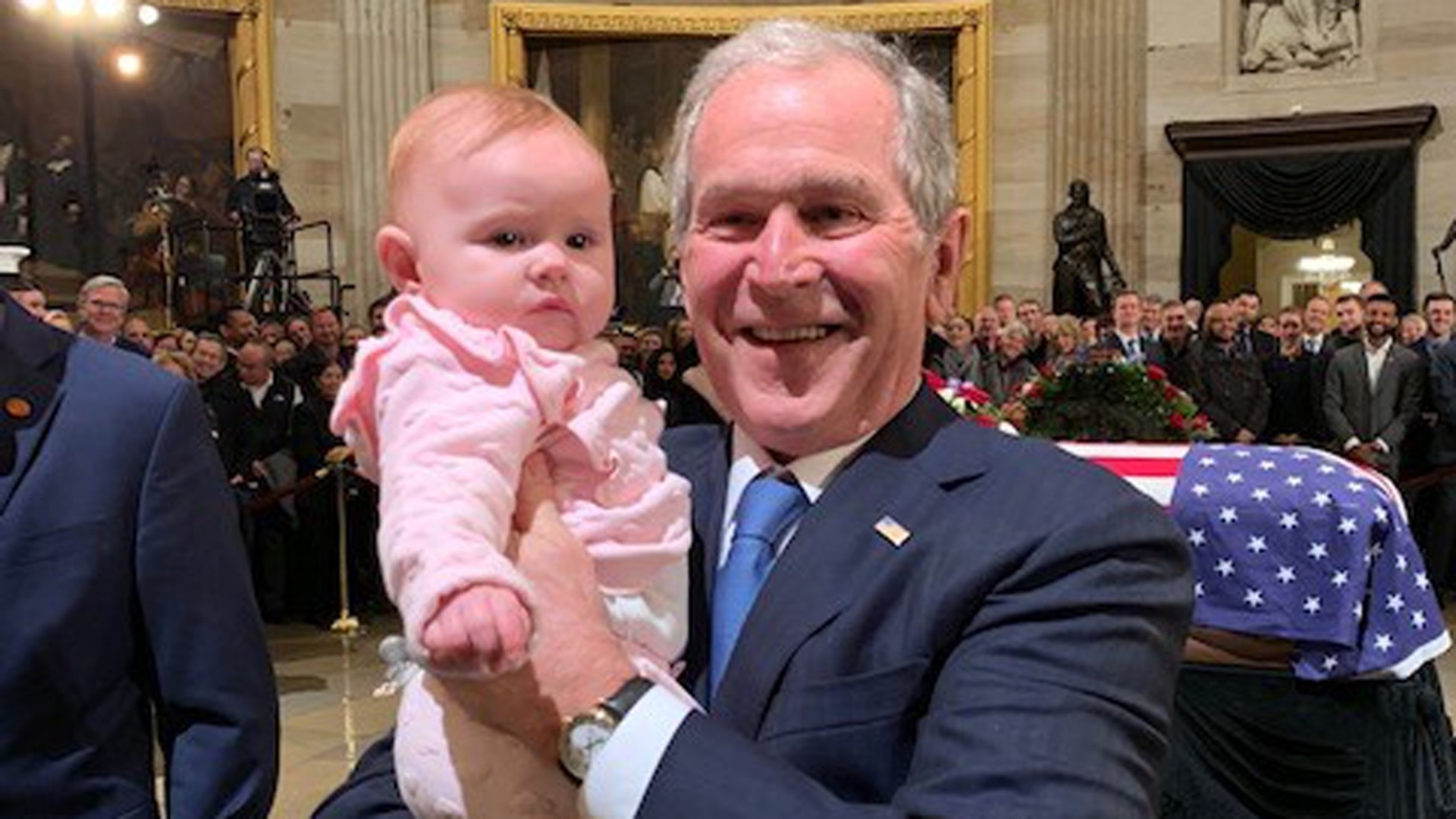 President George W. Bush snuggles Tampa baby during visit to father's ...