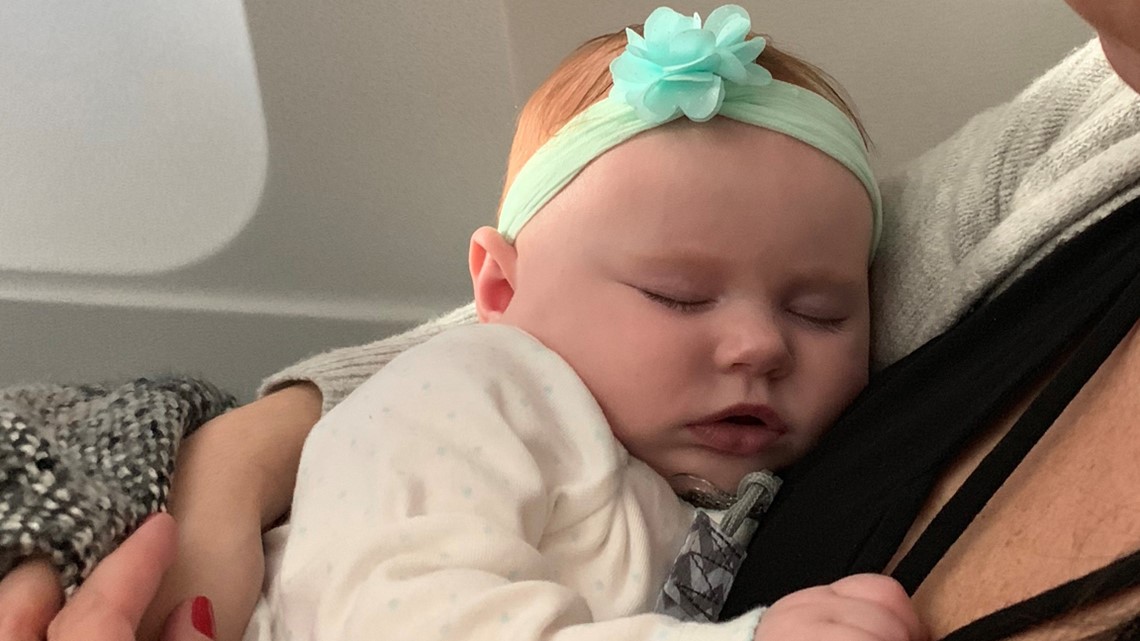 President George W. Bush snuggles Tampa baby during visit to father's ...