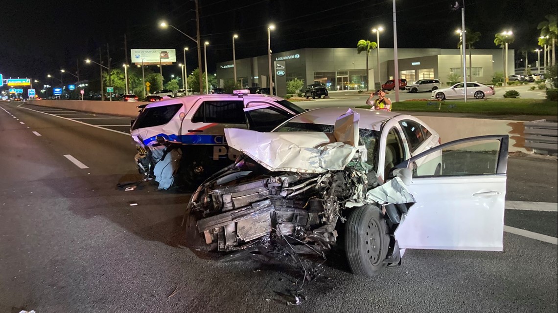 Driver fails to move over, crashes into back of police car | wtsp.com