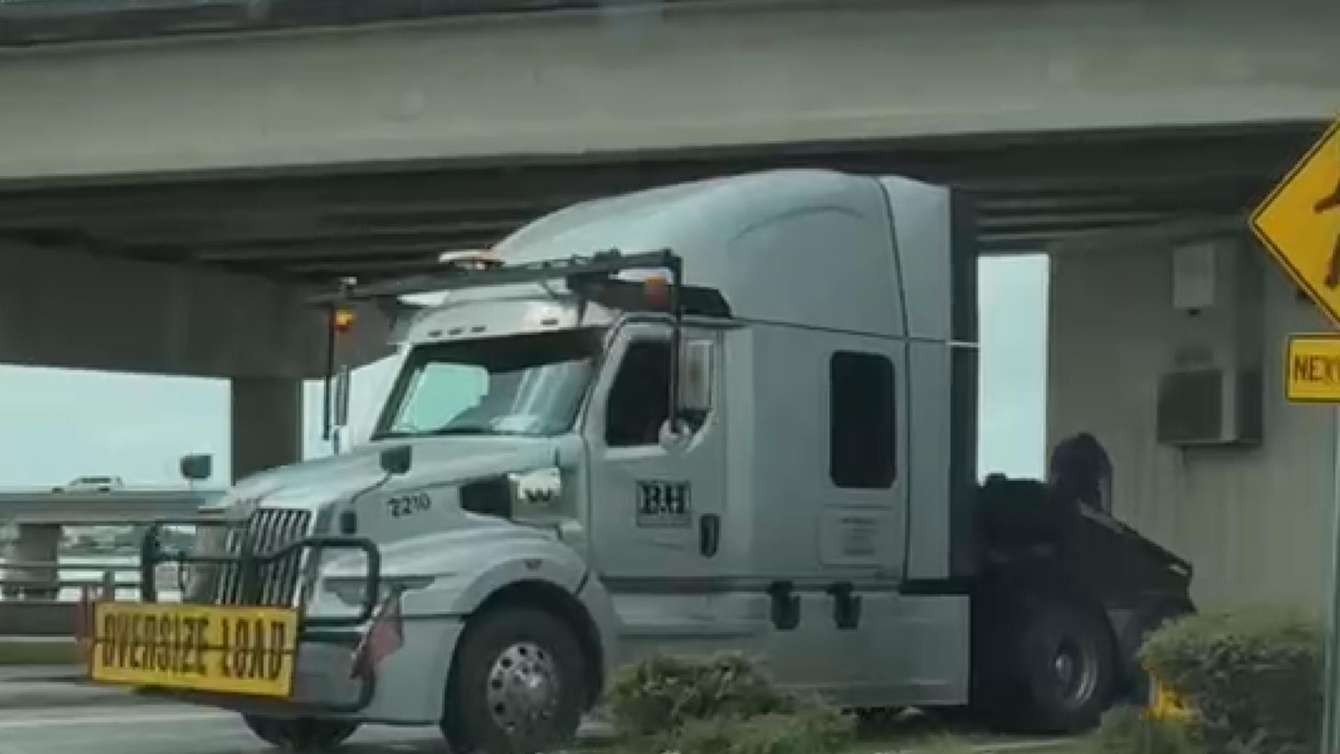 Semi-truck gets stuck under bridge on Bayshore Boulevard | wtsp.com