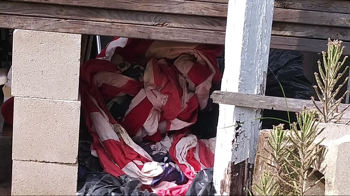 Somebody dumped American flags in trash bags outside the VFW | wtsp.com