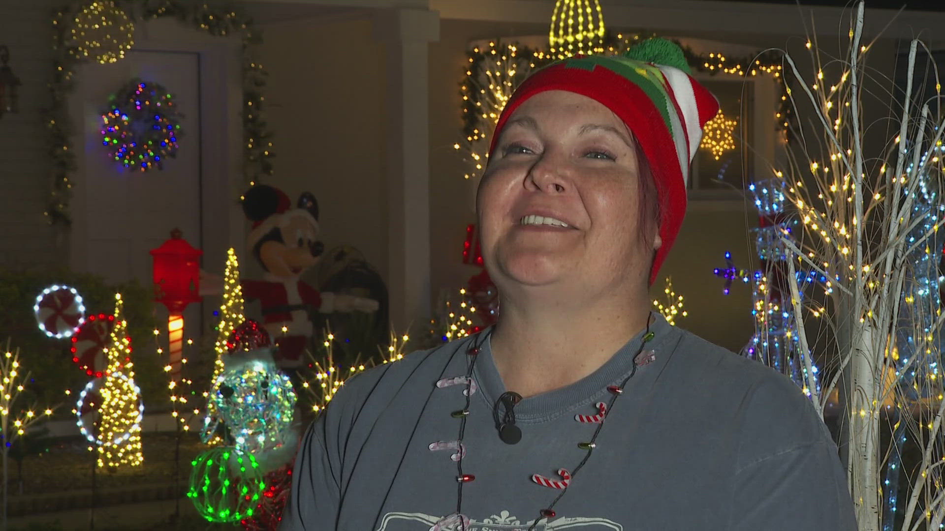 Woman uses extravagant Christmas light display to raise awareness of ...