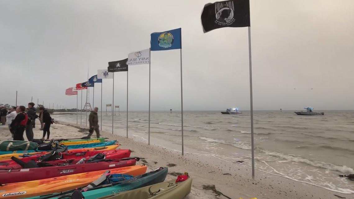 Hundreds take to to the water in Frogman Swim to honor fallen Navy ...