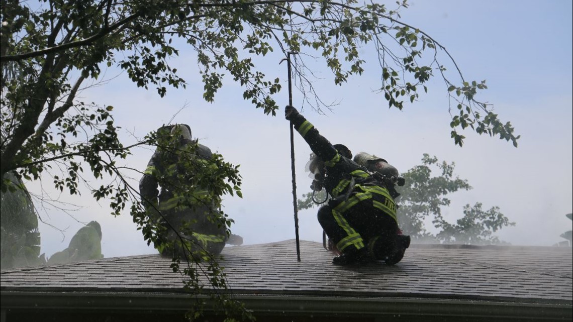 Firefighters stop attic fire by cutting holes into roof | wtsp.com