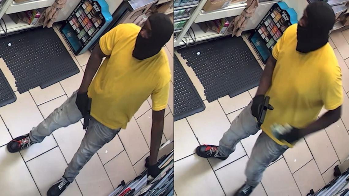 Video: Police search for man who robbed store, 'forced' clerk into ...