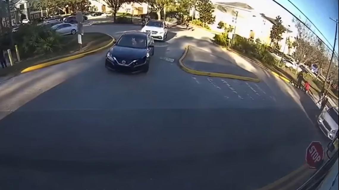 Child almost hit by car while getting off school bus in Tampa | wtsp.com