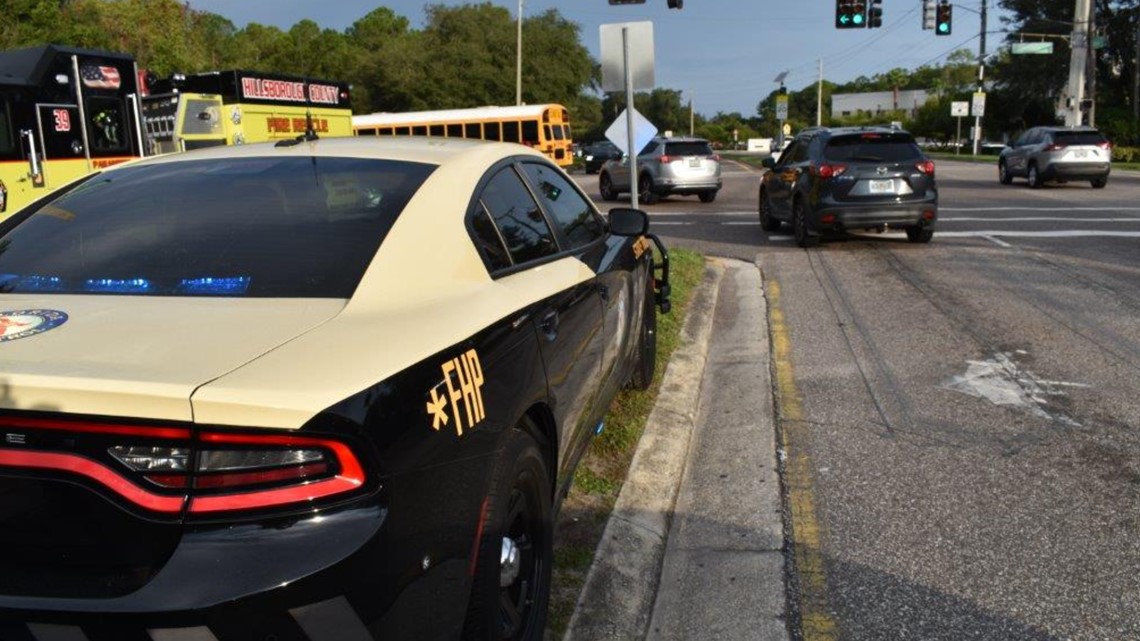 Woman accused of driving unregistered car painted like FHP car | wtsp.com