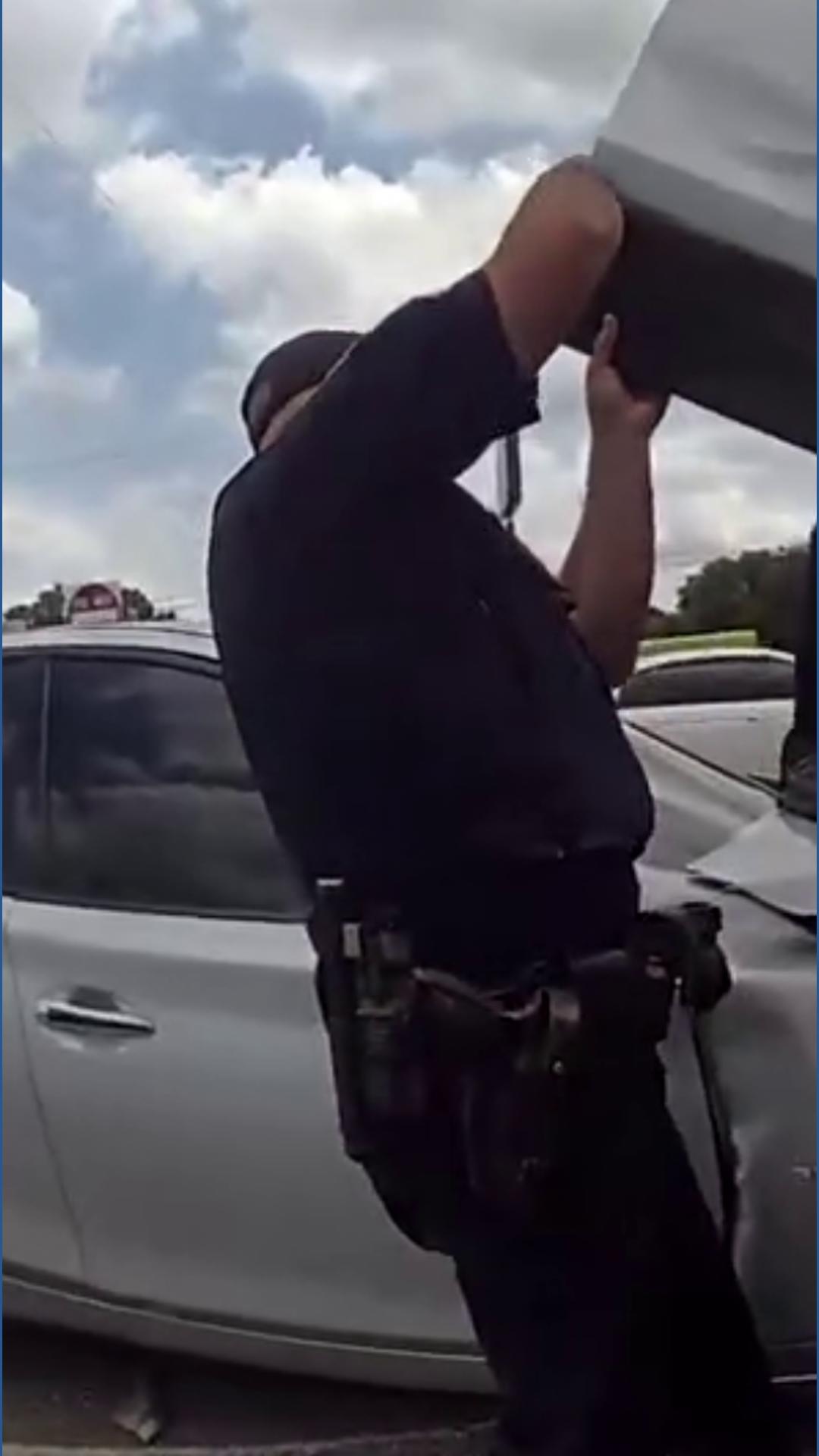 VIDEO: Tampa police rescue 7-year-old boy trapped in car after crash ...