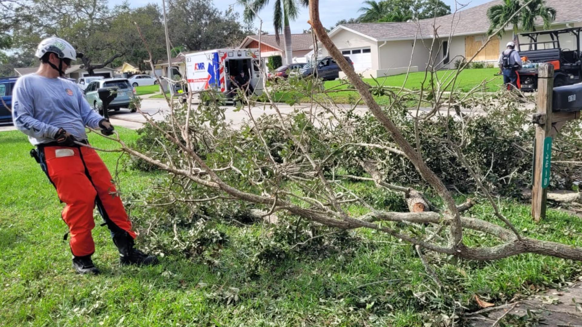 Miami-Dade firefighters help clear debris in Pinellas County | wtsp.com