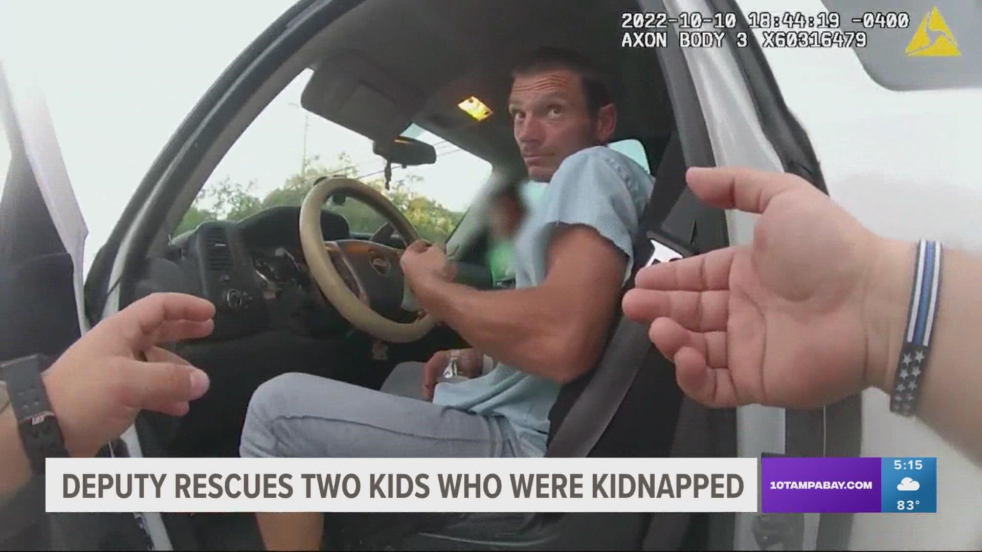 Watch: Man stopped by deputy after allegedly stealing truck with kids ...